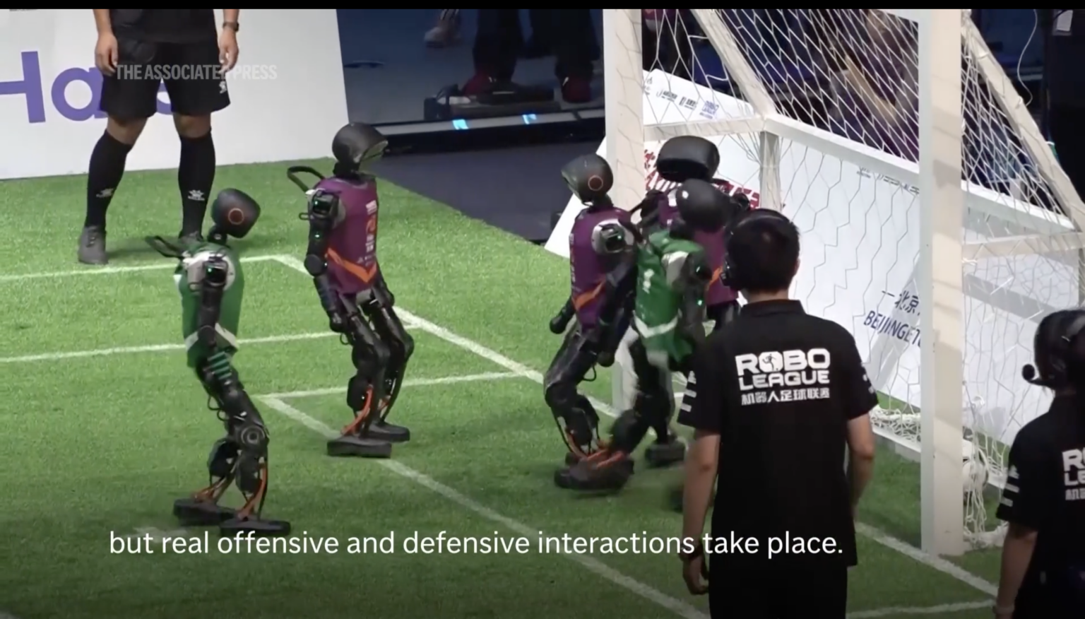 China's Humanoid Robots Play Autonomous Football