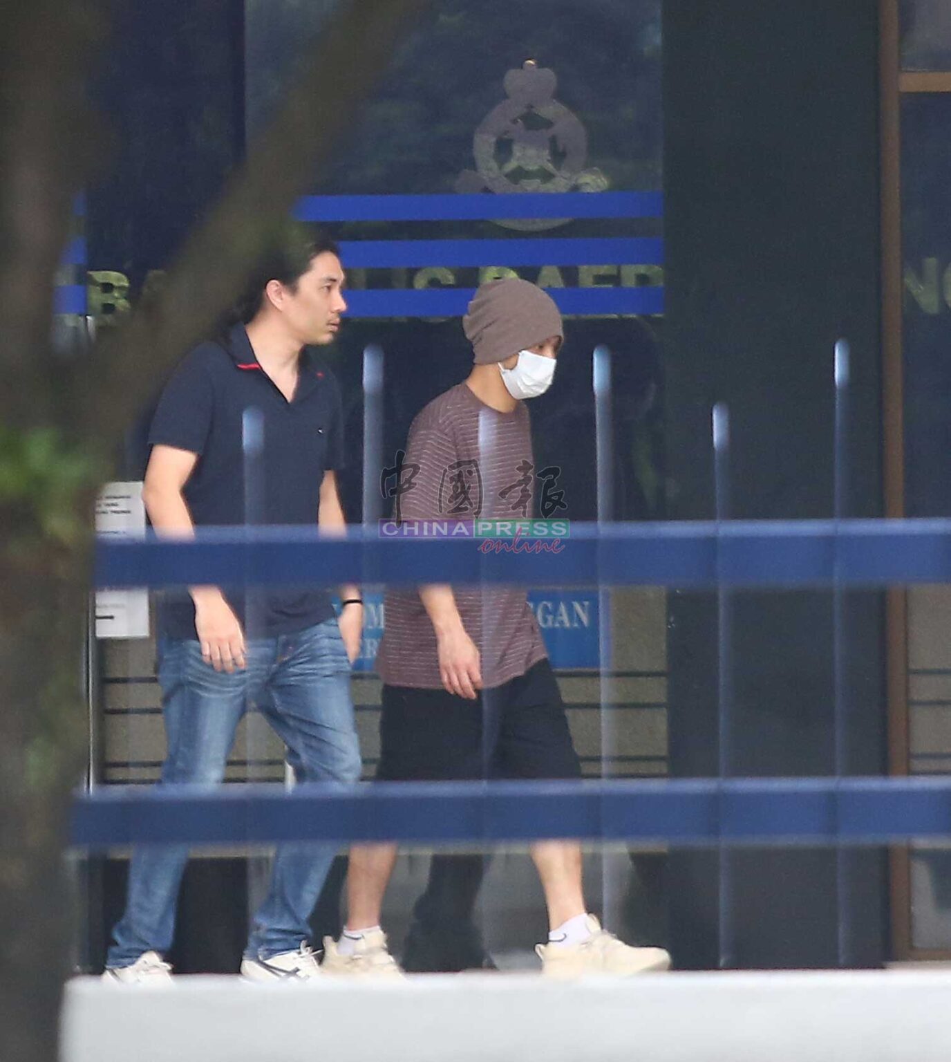 Photos Show Namewee Walking Out Of Police Lockup On 13-Day Bail